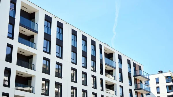 Modern condo building with big windows and modern facade. - Stock Image ...