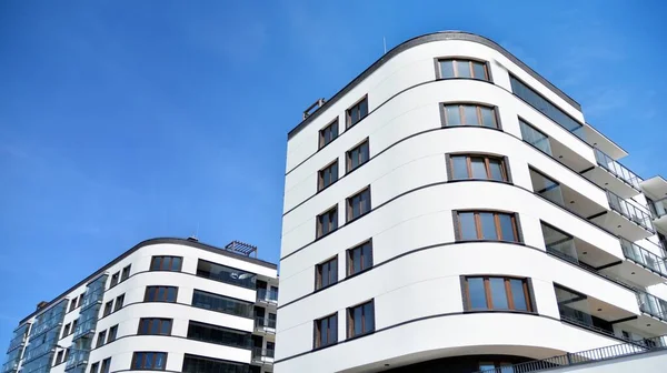 Modern condo building with big windows and modern facade. - Stock Image ...