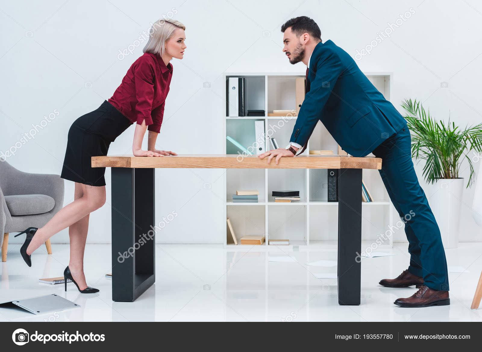 Side View Young Business People Leaning Table Looking Each Other Stock