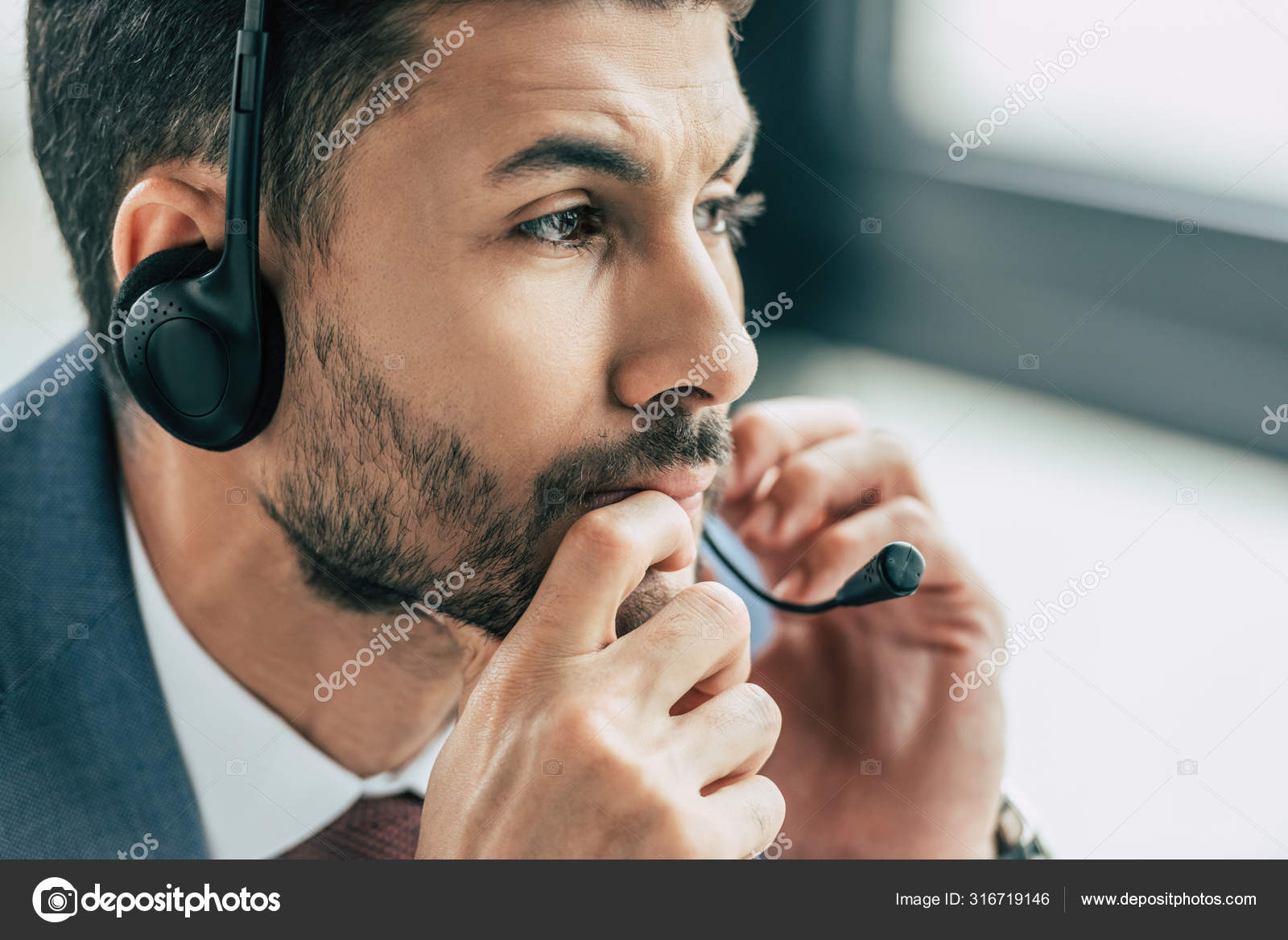 Thoughtful Call Center Operator Headset Looking Away Holding Head Face ...