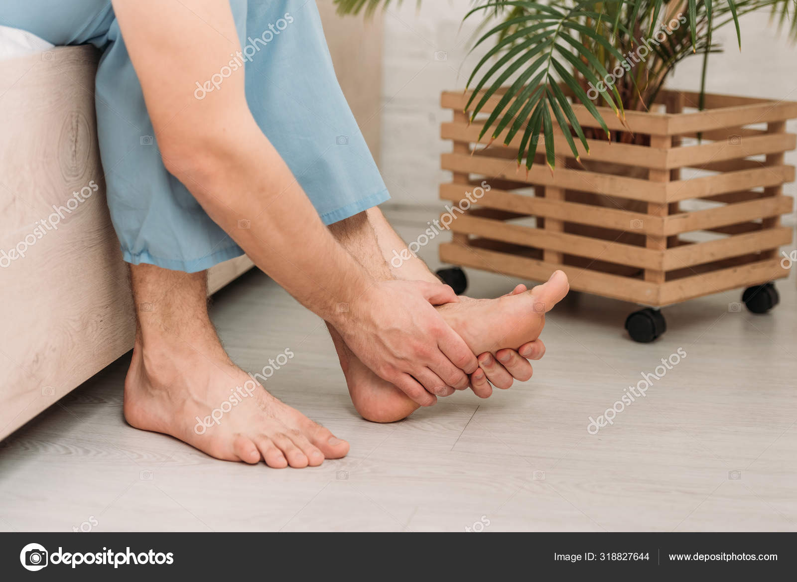 Cropped View Man Touching Foot While Sitting Bed Suffering Pain ⬇ Stock ...