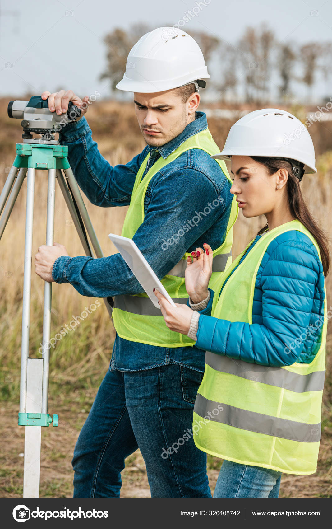 Surveyors Digital Level Looking Tablet Field Stock Photo by ...