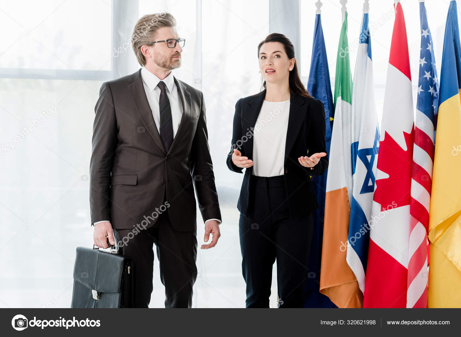 Ambassador Gesturing While Talking Diplomat Flags Embassy — Stock Photo ...