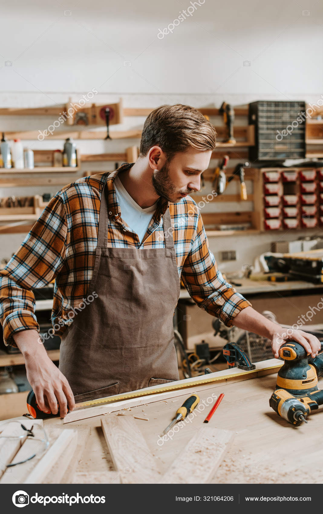 Handsome Carpenter Brown Apron Measuring Wooden Plank — Stock Photo ...