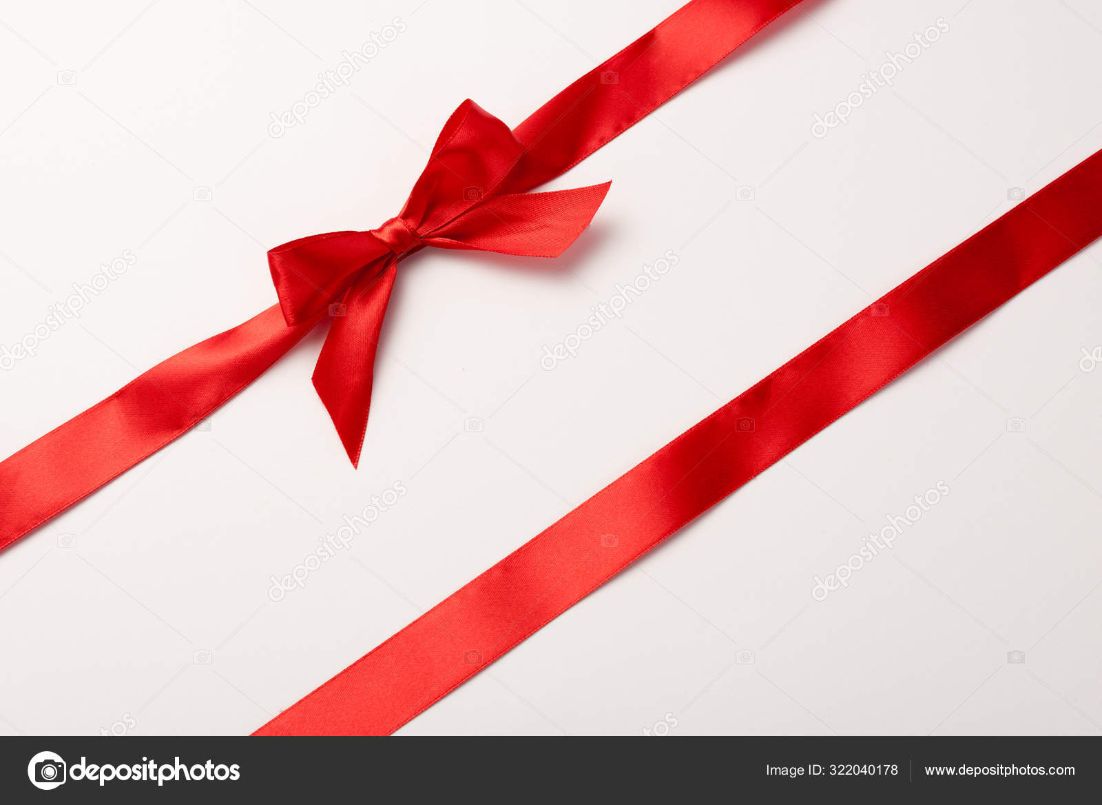 Top View Red Ribbon Satin Bow White — Stock Photo © AndrewLozovyi ...