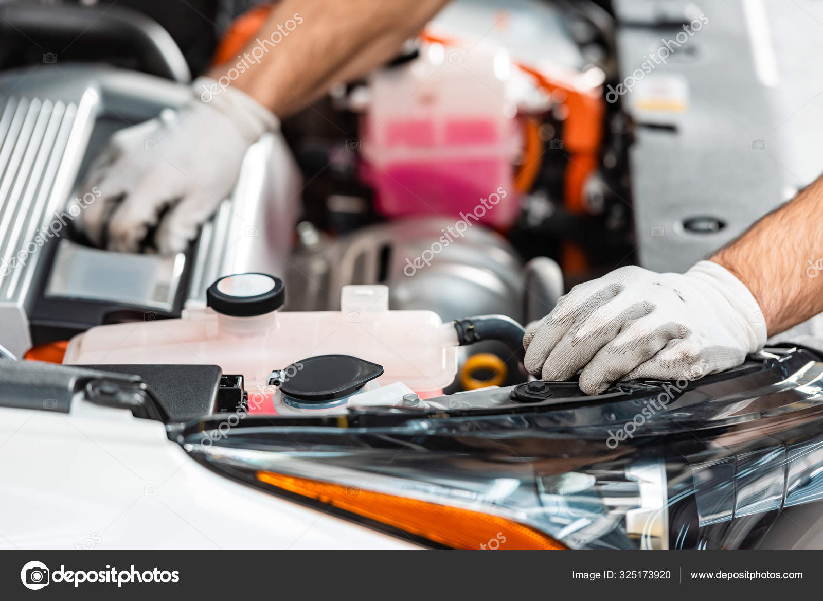 Cropped View Mechanic Inspecting Car Engine Compartment Stock Photo by ...