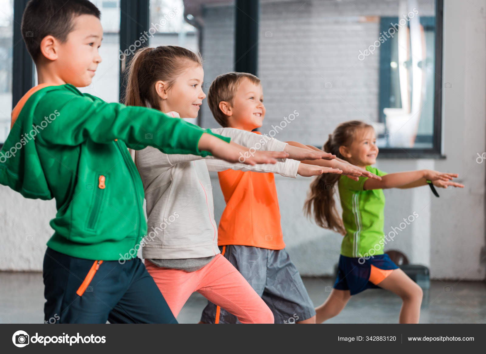 Selective Focus Multiethnic Children Outstretched Hands Doing Lunges ...