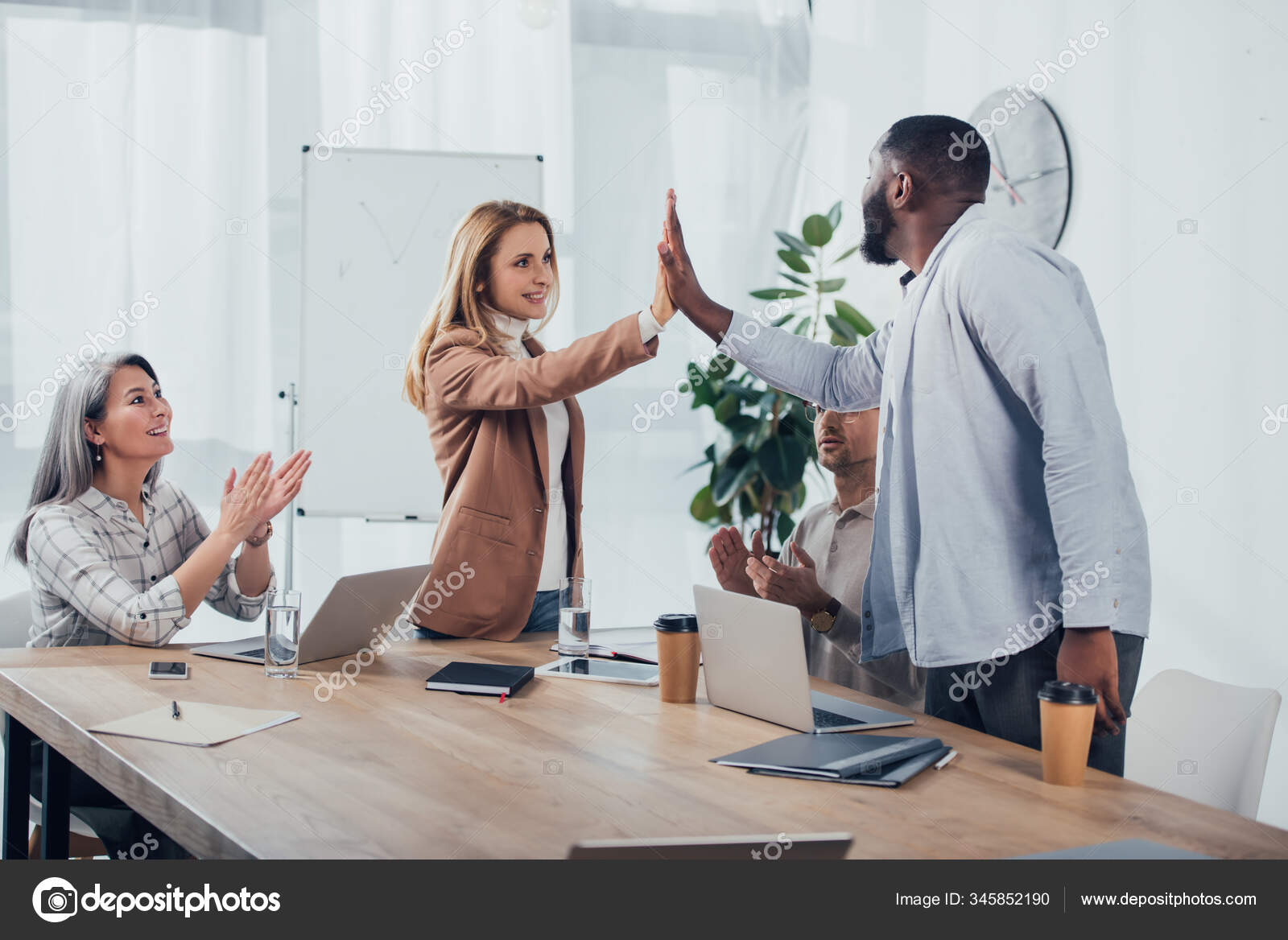 Smiling Multicultural Colleagues Clapping Giving High Five Creative ...