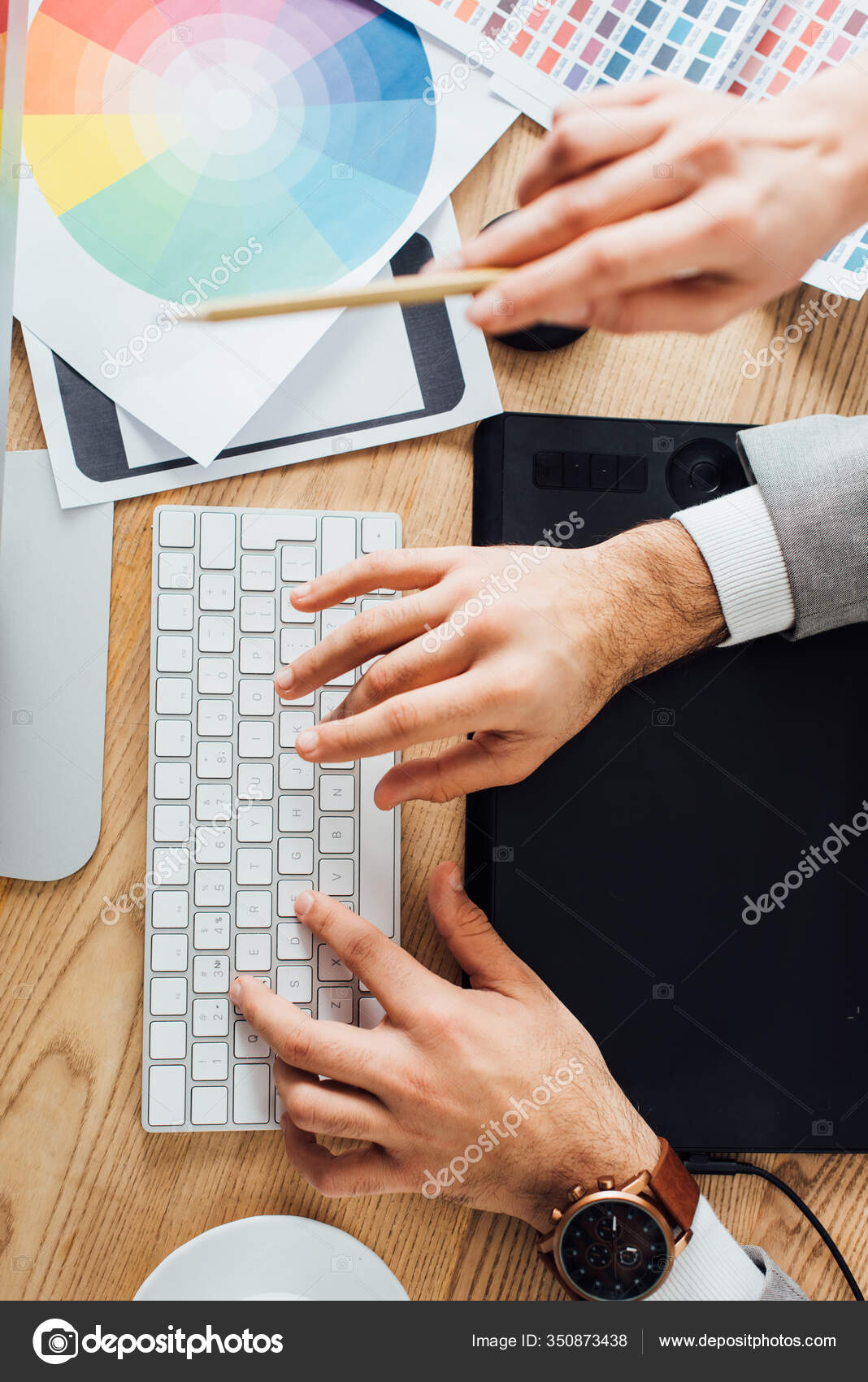 Top View Designers Using Computer Color Pallets Graphics Tablet Coffee ...