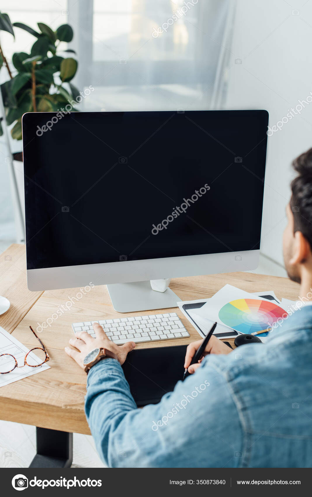 Back View Designer Using Graphics Tablet Computer Sketches Table ...