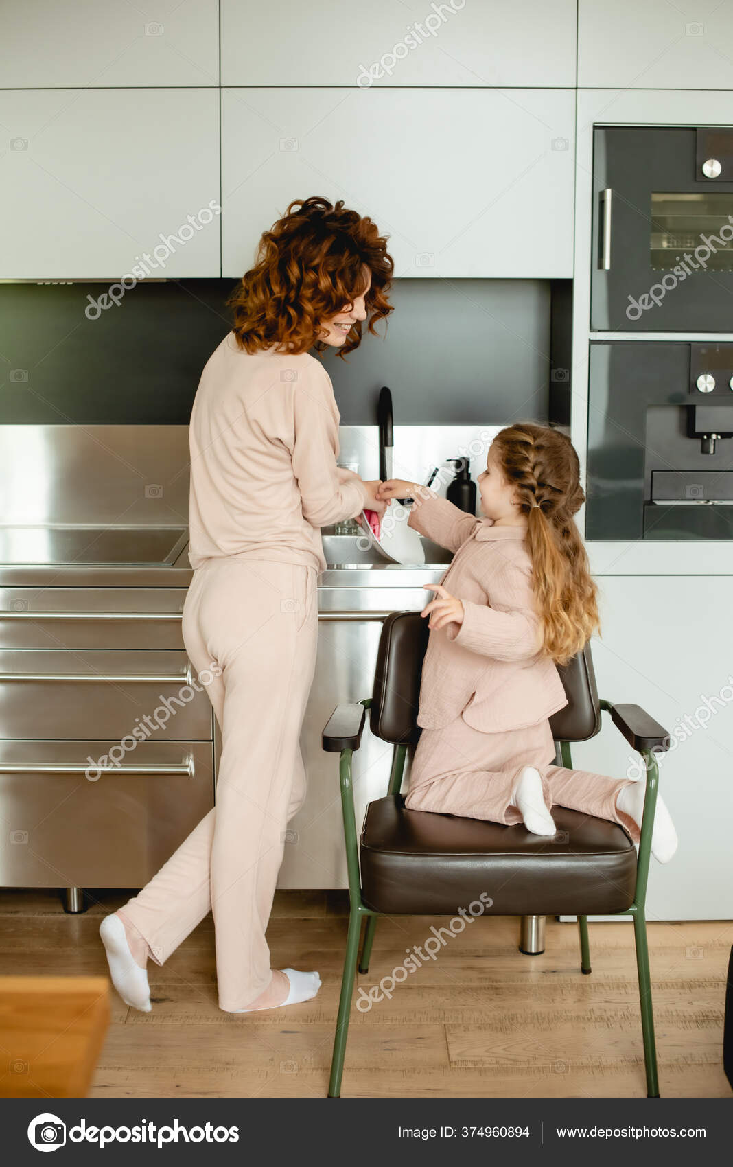 Happy Daughter Washing Plate Curly Mother — Stock Photo © AndrewLozovyi ...