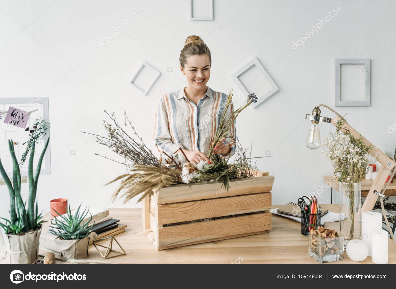 Florist with flowers at workplace — Stock Photo © ViktoriaSapata #159149034