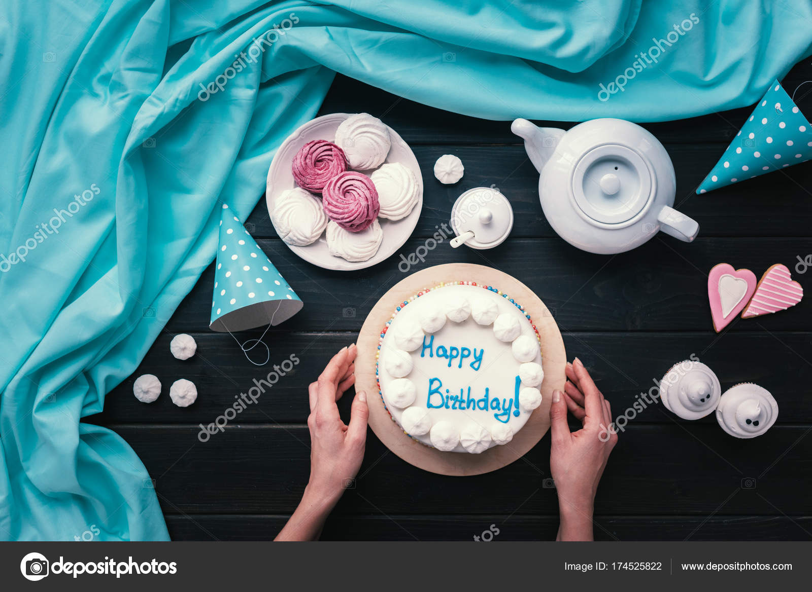 Woman putting birthday cake on table — Stock Photo © ViktoriaSapata ...