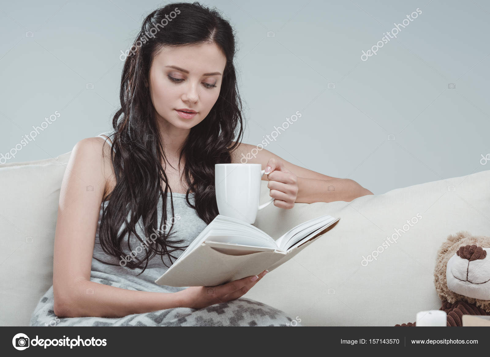 Young woman reading book — Stock Photo © VitalikRadko #157143570 Young woman reading book — Stock Photo © VitalikRadko #157143570