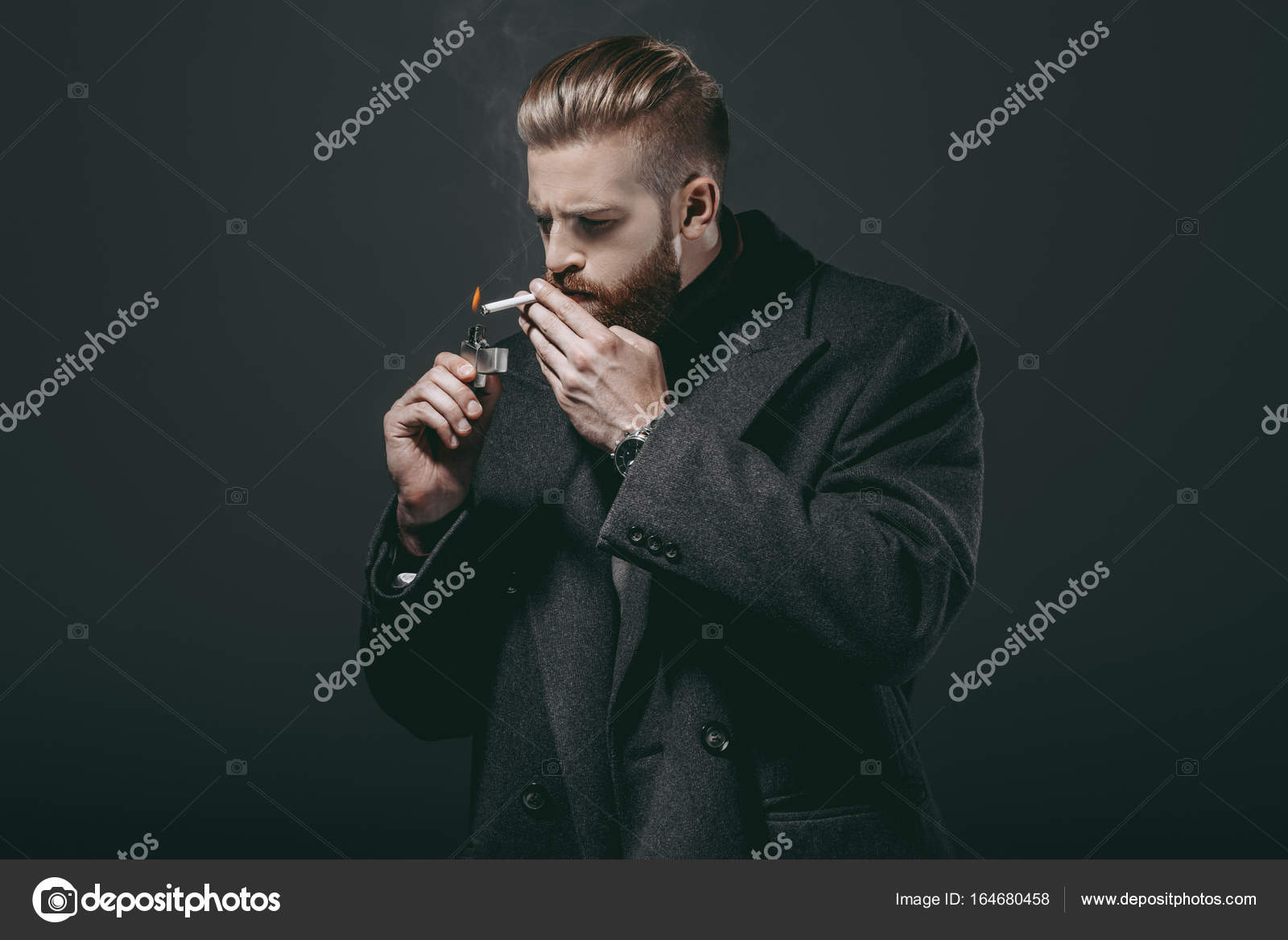 Stylish man smoking cigarette — Stock Photo © VitalikRadko #164680458
