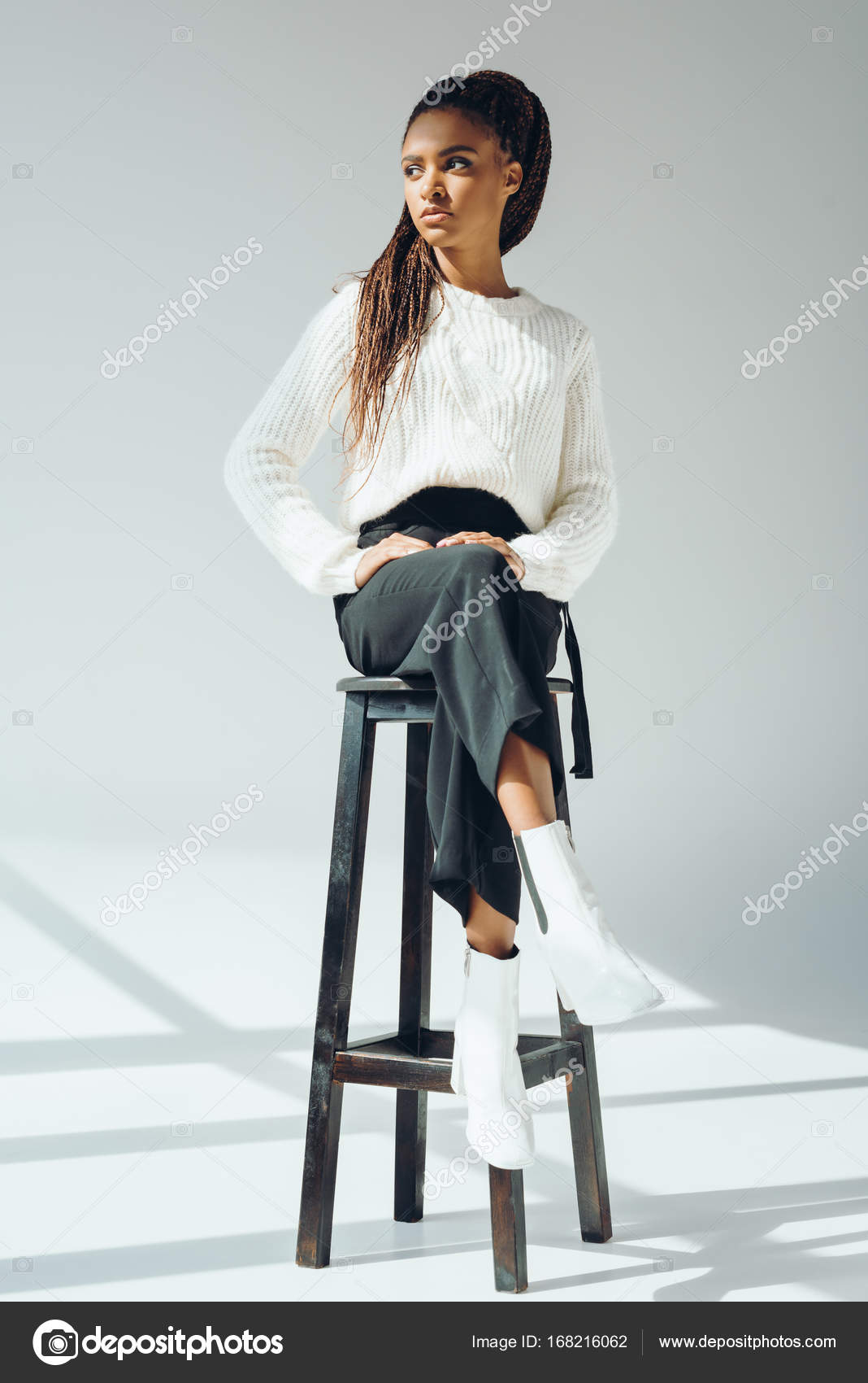 African american model posing with stool Stock Photo by ©VitalikRadko ...