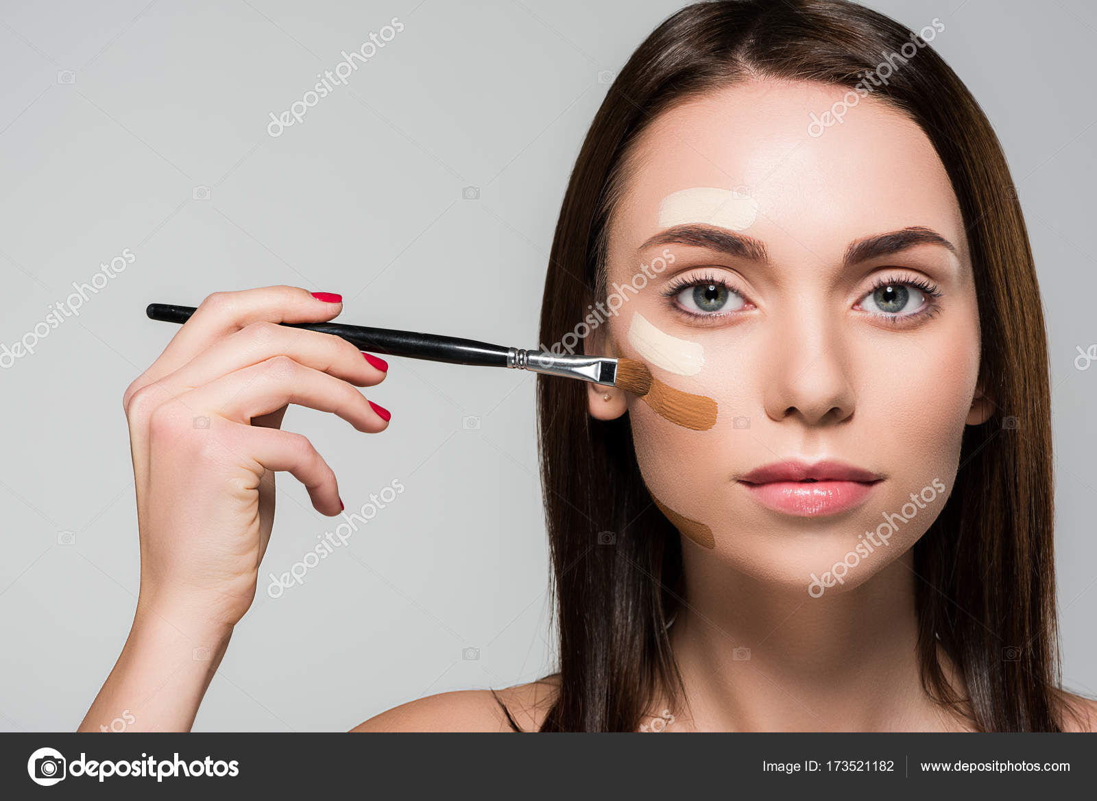 Woman with tonal foundation on face — Stock Photo © VitalikRadko #173521182