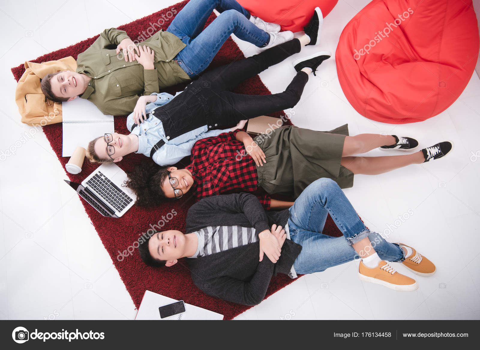 Young Teen Students Lying Carpet Notebooks Laptop Stock Photo by ...
