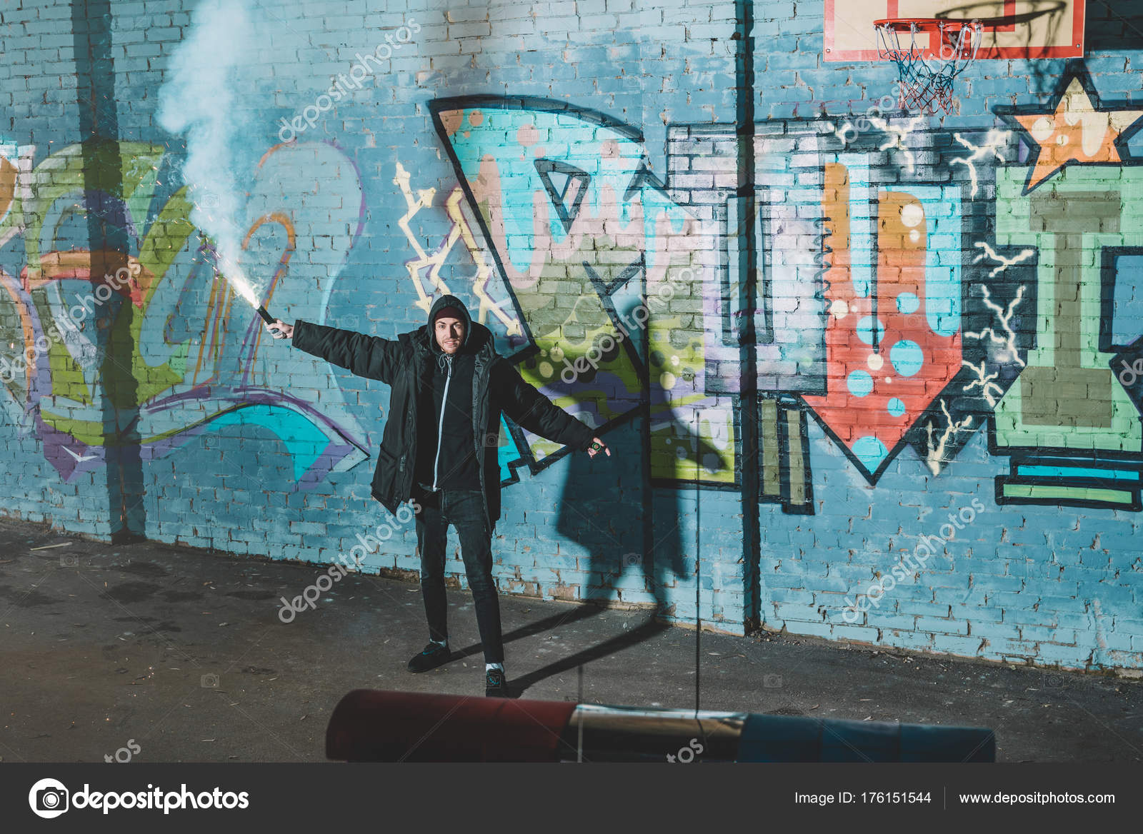 Man Holding Smoke Bomb Standing Wall Graffiti Night – Stock Editorial ... Man Holding Smoke Bomb Standing Wall Graffiti Night – Stock Editorial ...