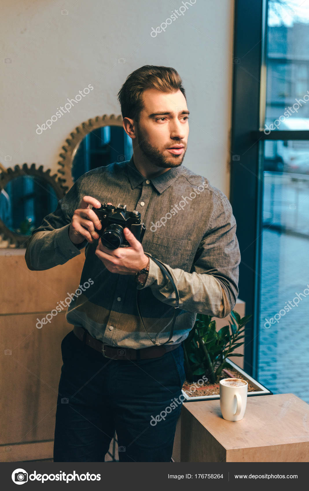 Portrait Thoughtful Man Photo Camera Standing Window Cafe — Free Stock ...