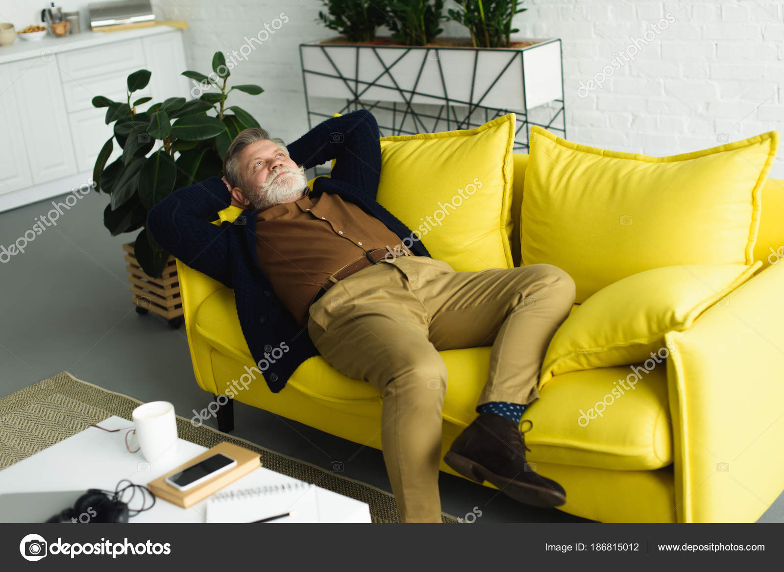 Pensive Bearded Senior Man Lying Sofa Hands Head Looking — Free Stock ...