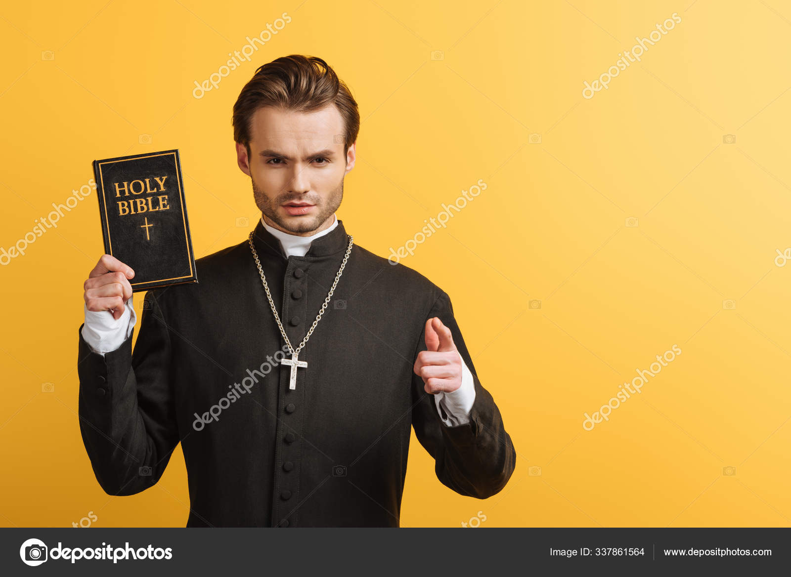 Serious Catholic Priest Pointing Finger Camera While Holding Bible ...
