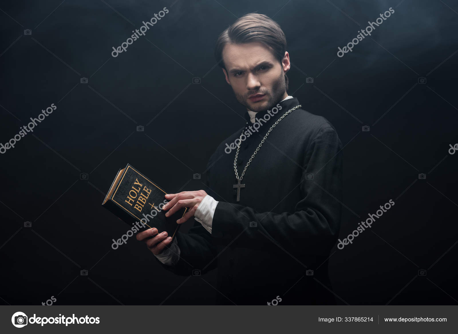 Strict Catholic Priest Holding Holy Bible Looking Camera Black ...