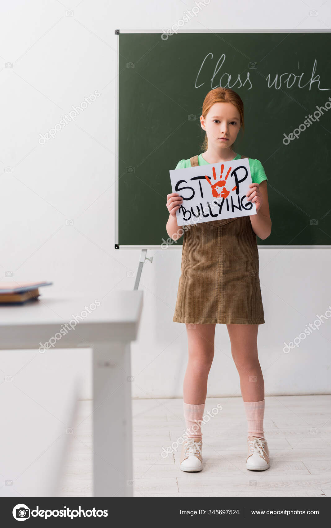 Selective Focus Kid Holding Placard Stop Bullying Lettering Classroom ...