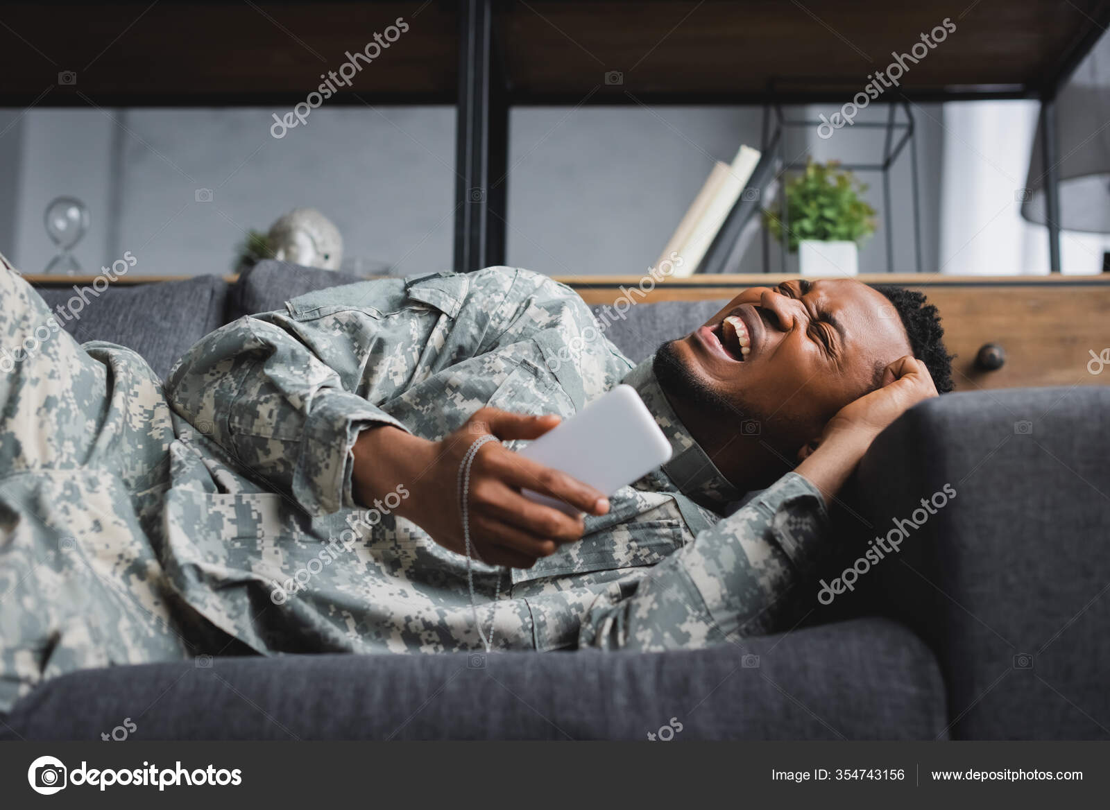 Stressed African American Soldier Crying While Holding Army Badge ...