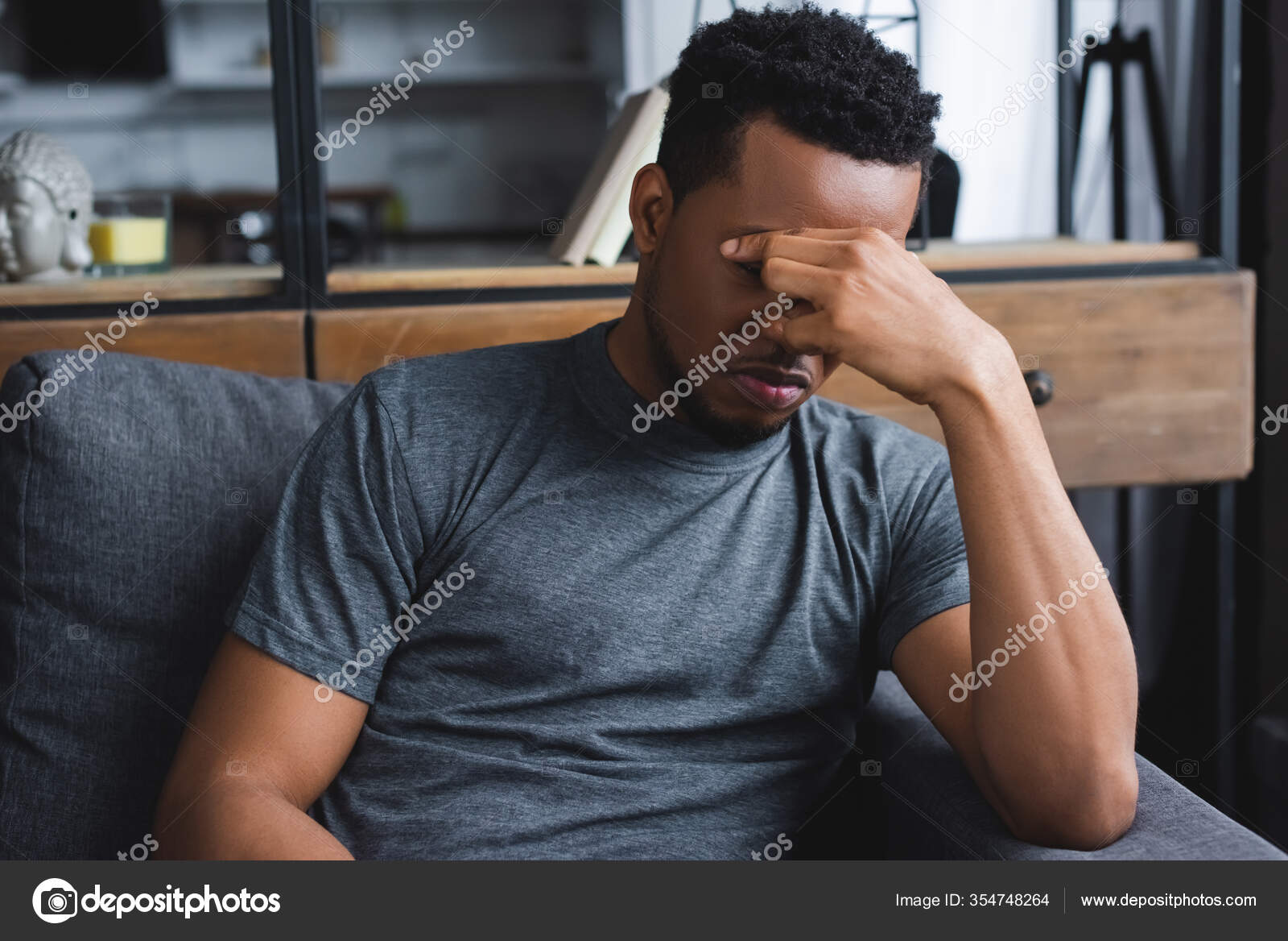 Frustrated African American Man Sitting Sofa Home Stock Photo by ...