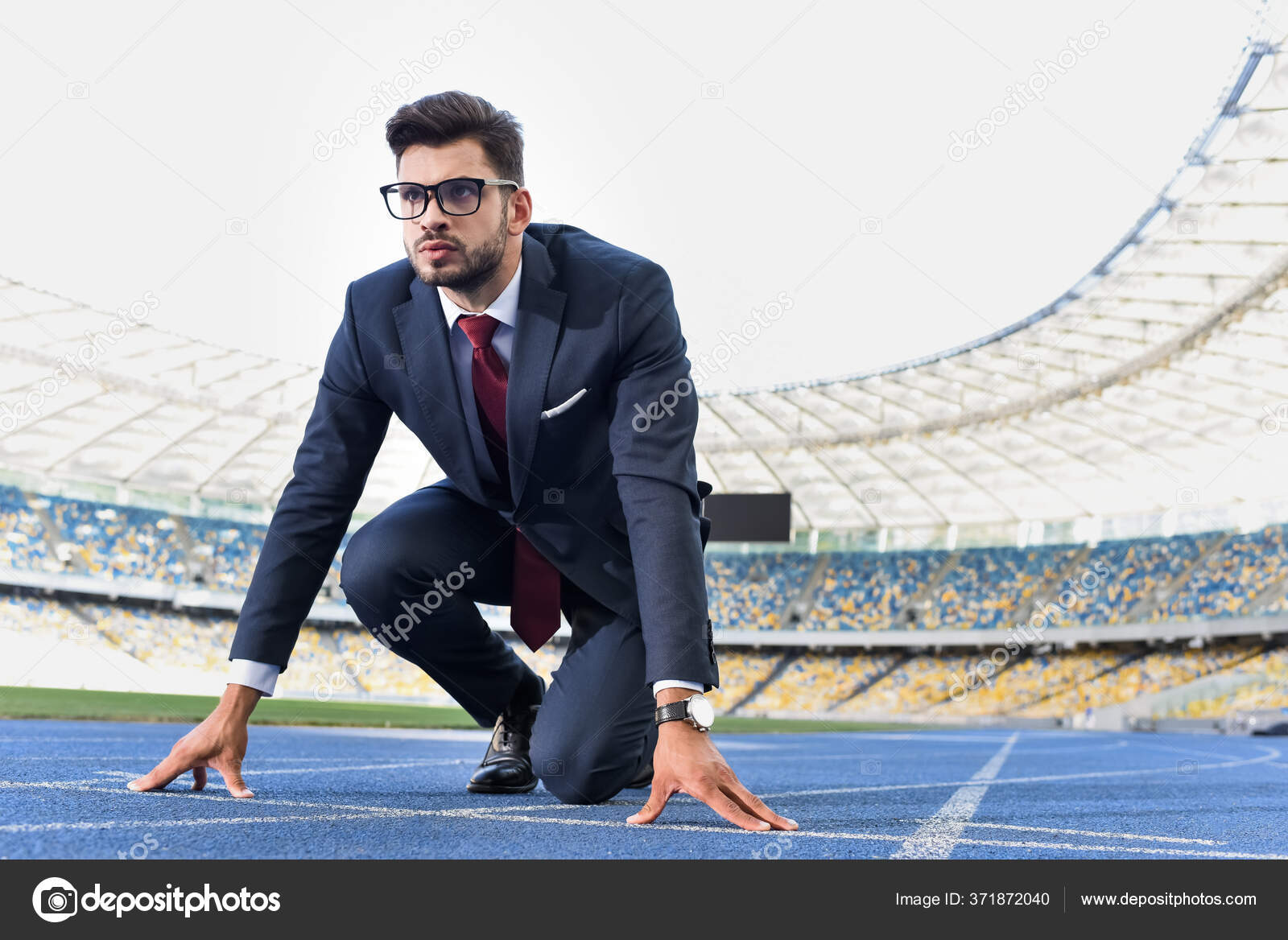 Young Businessman Suit Start Position Running Track Stadium Stock Photo ...