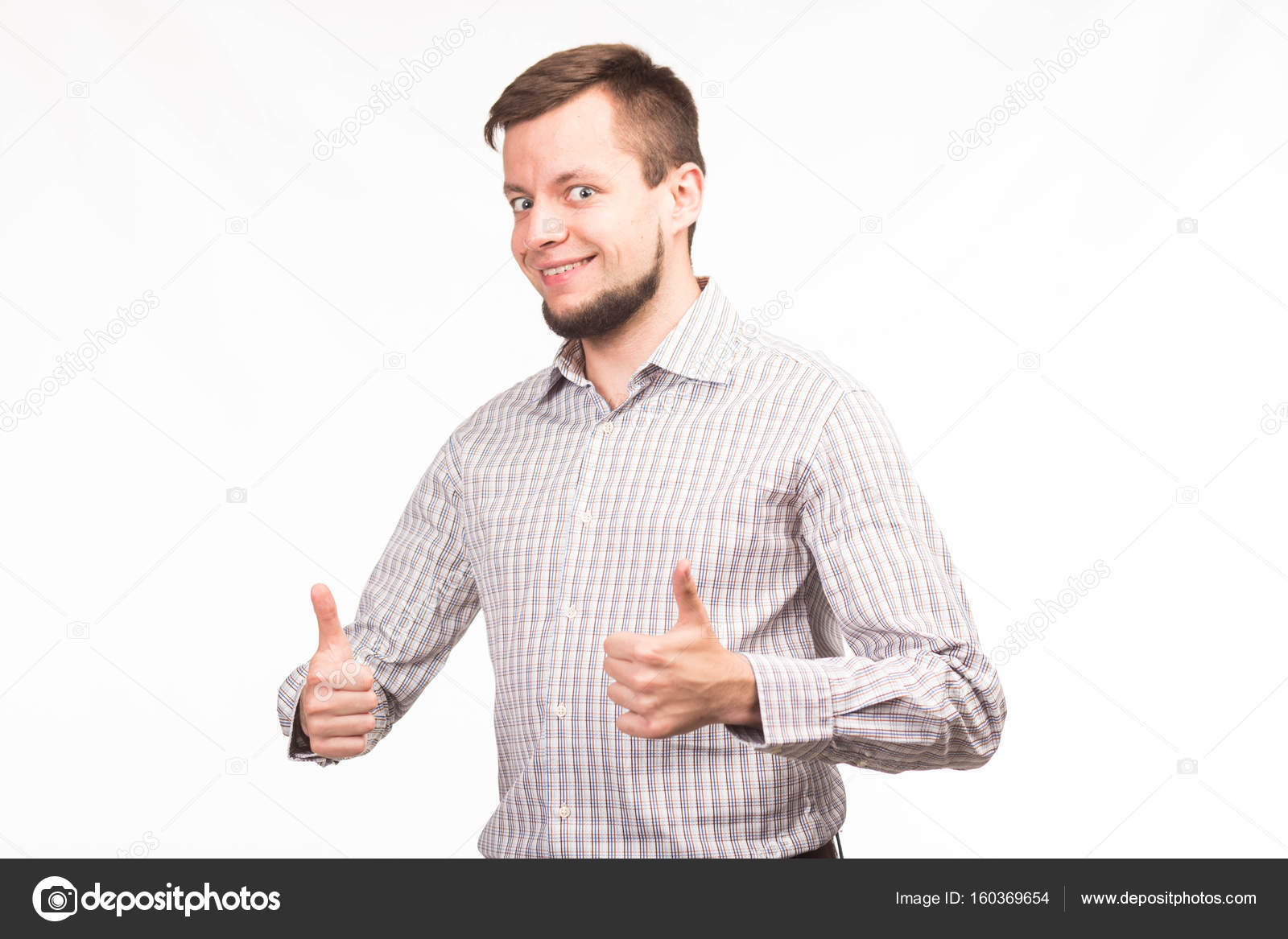 Young happy man showing presentation, pointing on placard Stock Photo ...
