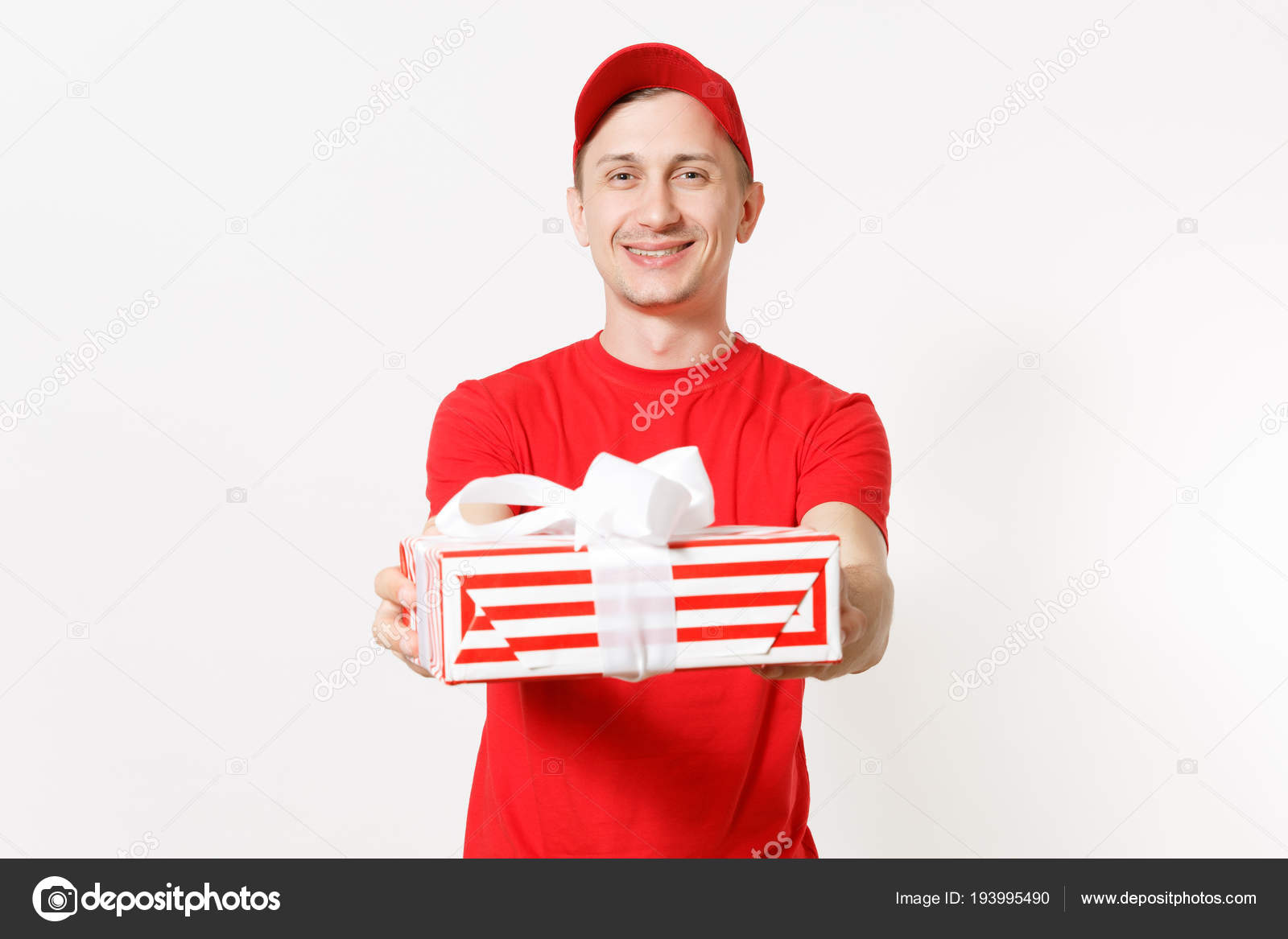 Delivery man in red uniform isolated on white background. Smiling male ...