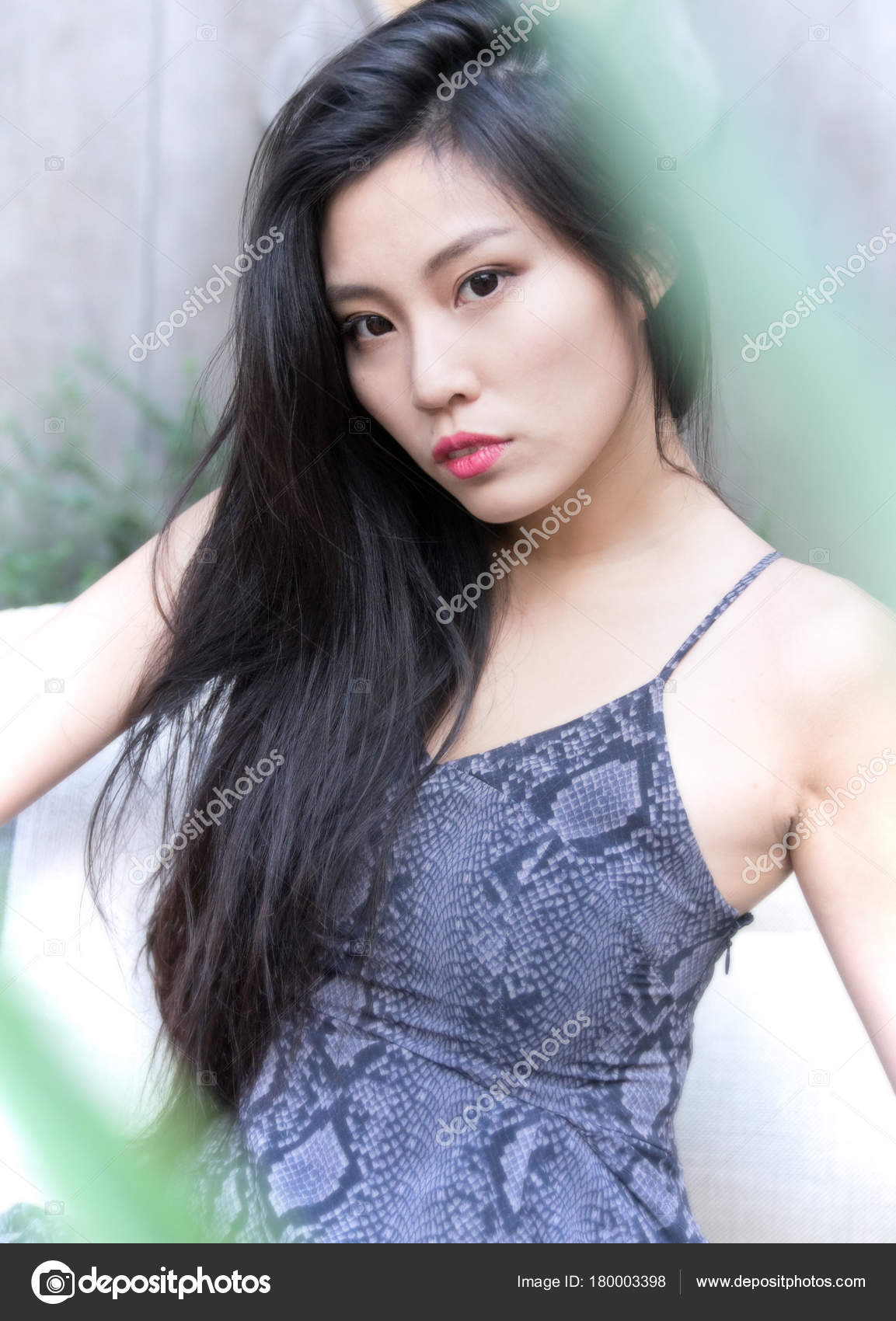 Beautiful young Asian woman Stock Photo by ©AVFC 180003398 Beautiful young Asian woman Stock Photo by ©AVFC 180003398