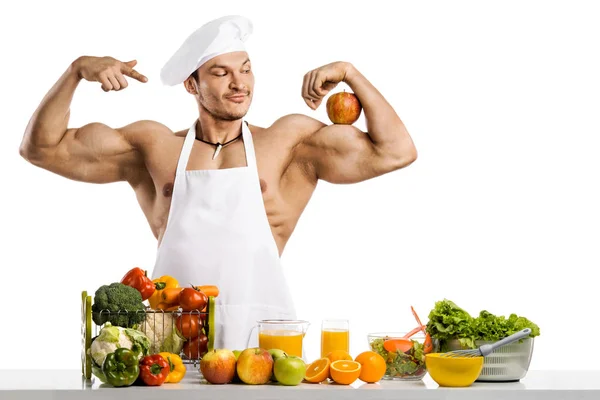 Man bodybuilder cook with apple on biceps Stock Photo by ©tankist276 ...
