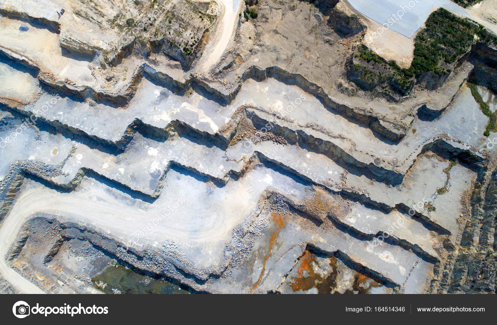 Aerial view on a stone quarry — Stock Photo © altitudedrone #164514346