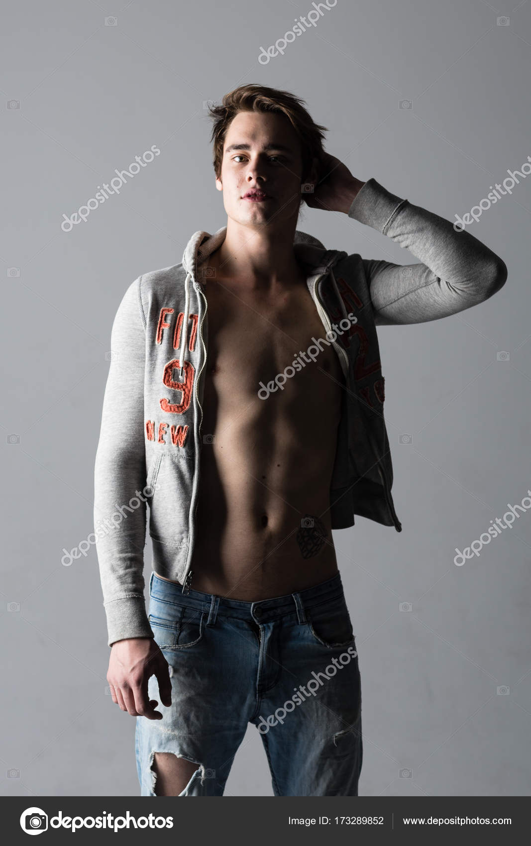 Male model commercial ad shoot at the studio Stock Photo by ©byazrov ...