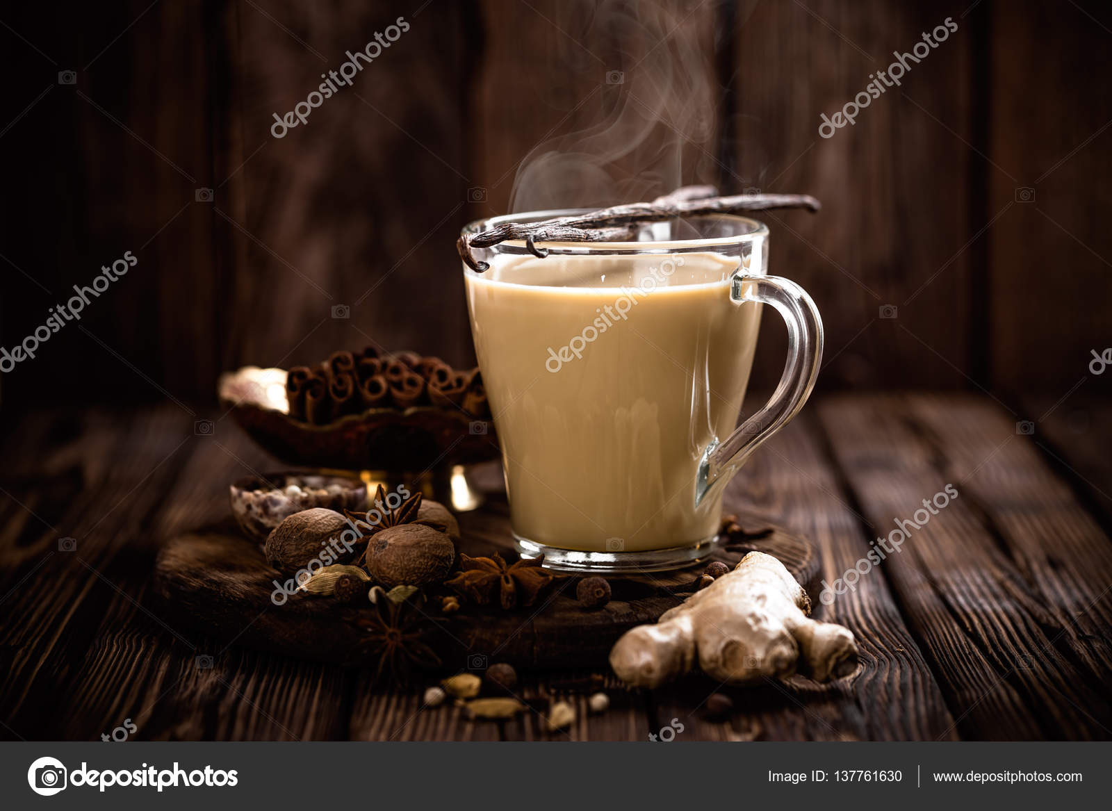 Masala chai tea on wooden background Stock Photo by ©ivan_dzyuba 137761630