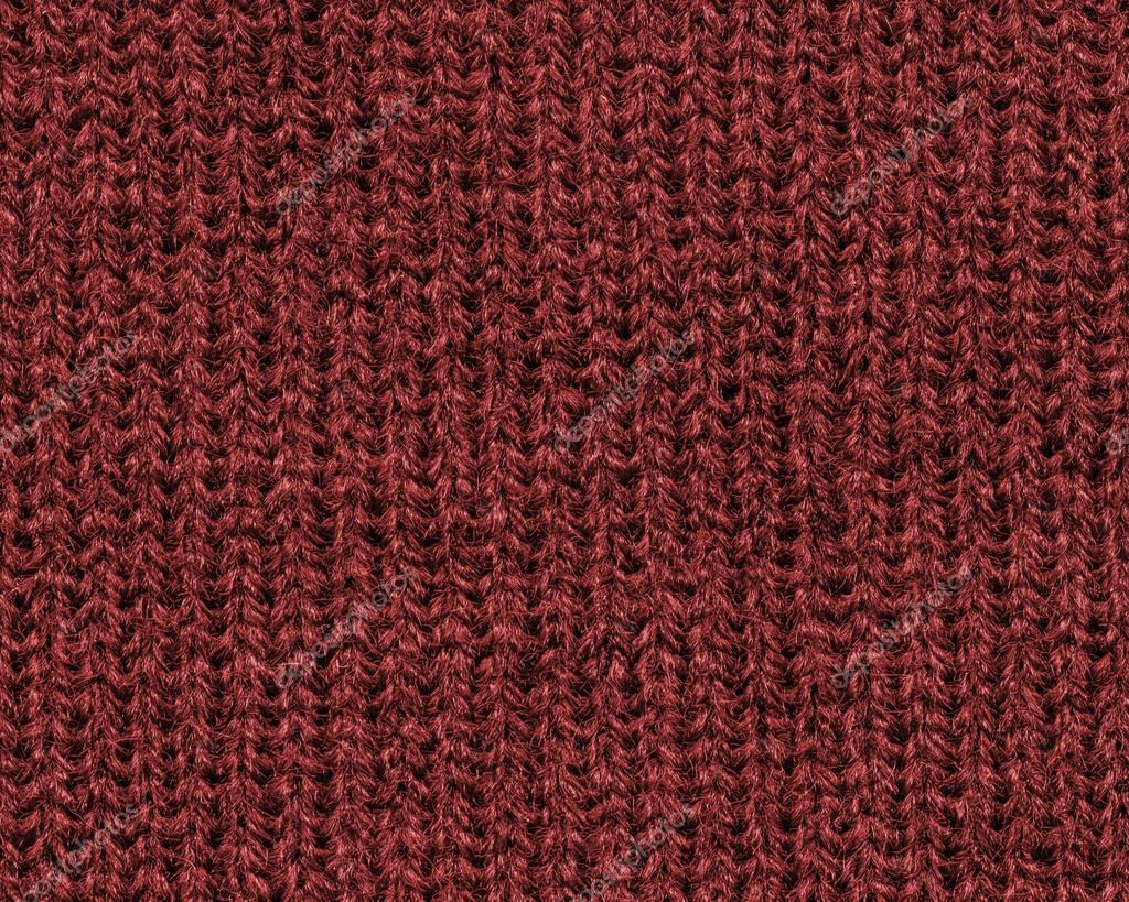 Red knitting fabric texture closeup Stock Photo by ©natalt 129562726