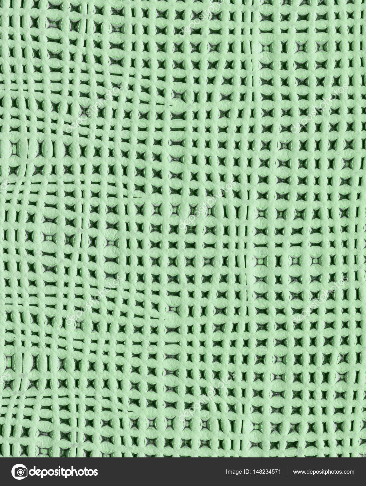 Green perforated synthetic material texture closeup. Stock Photo by ...