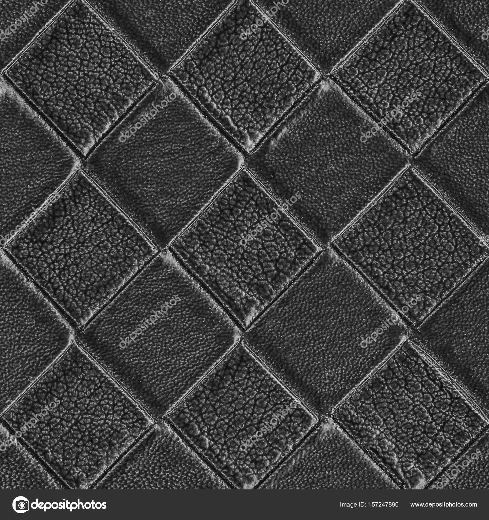 Black leatherette texture as background. — Stock Photo © natalt #157247890