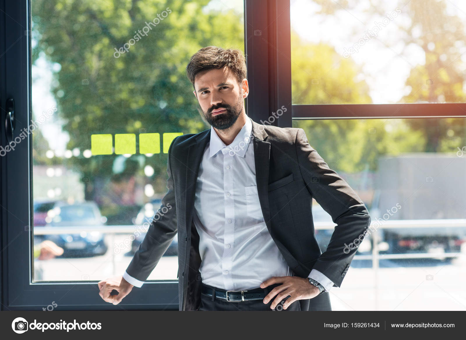 Confident businessman in office — Stock Photo © VadimVasenin #159261434