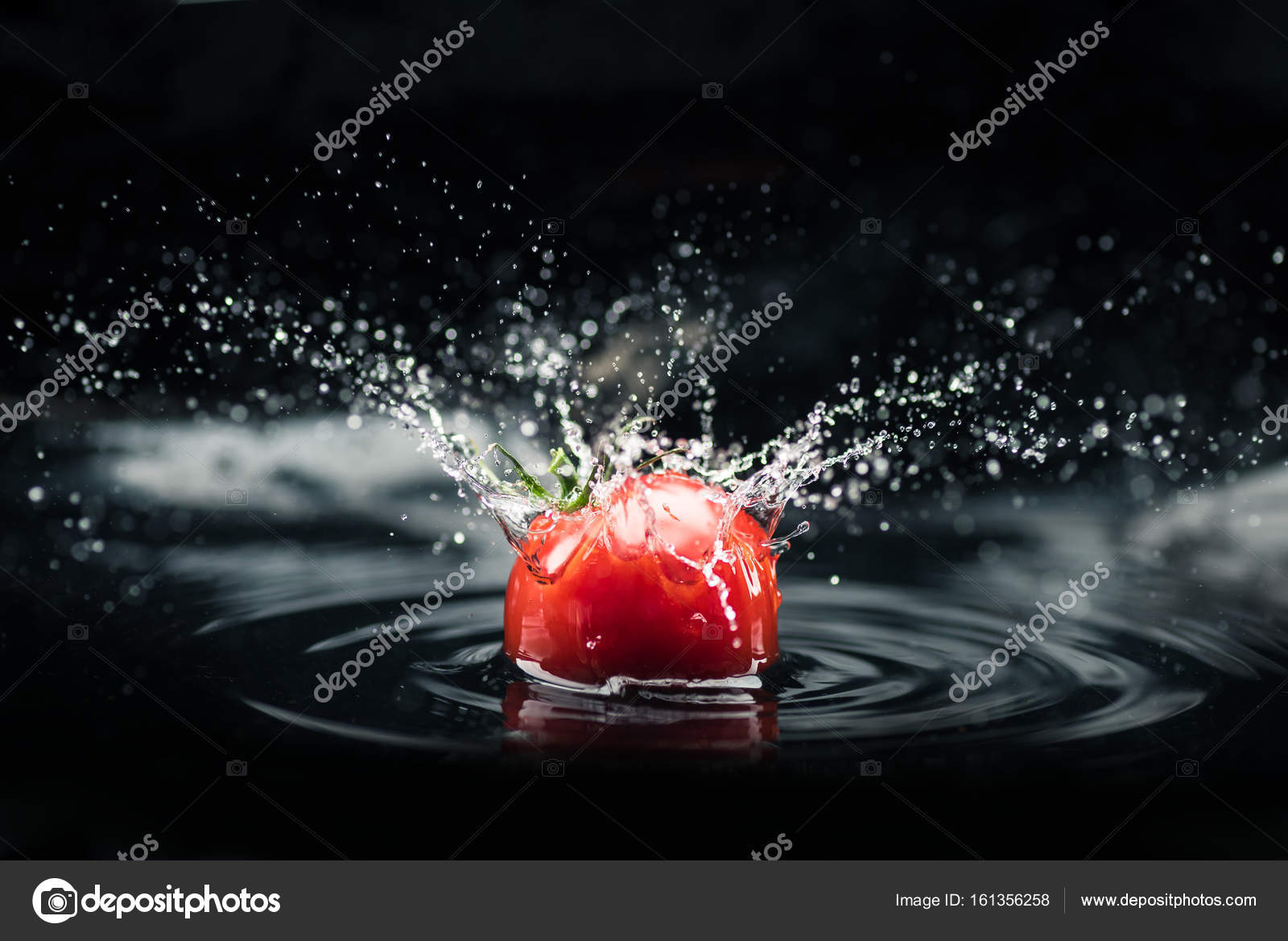 Fresh tomato falling in water — Stock Photo © VadimVasenin #161356258