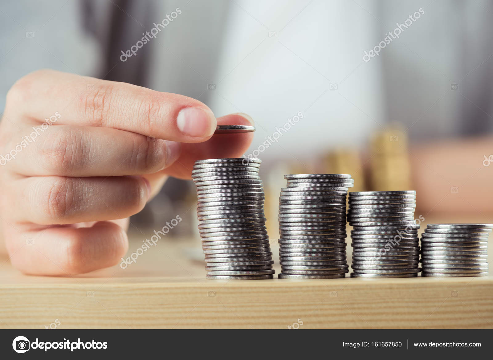 Person stacking coins — Stock Photo © VadimVasenin #161657850