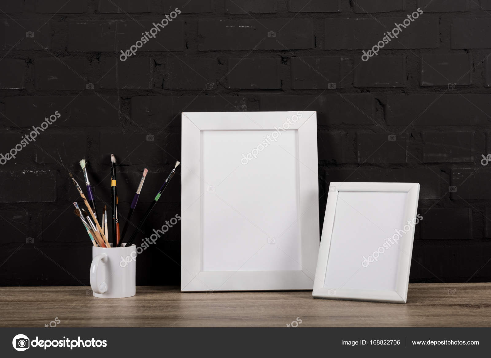 Photo frames and drawing equipment on table — Stock Photo ...
