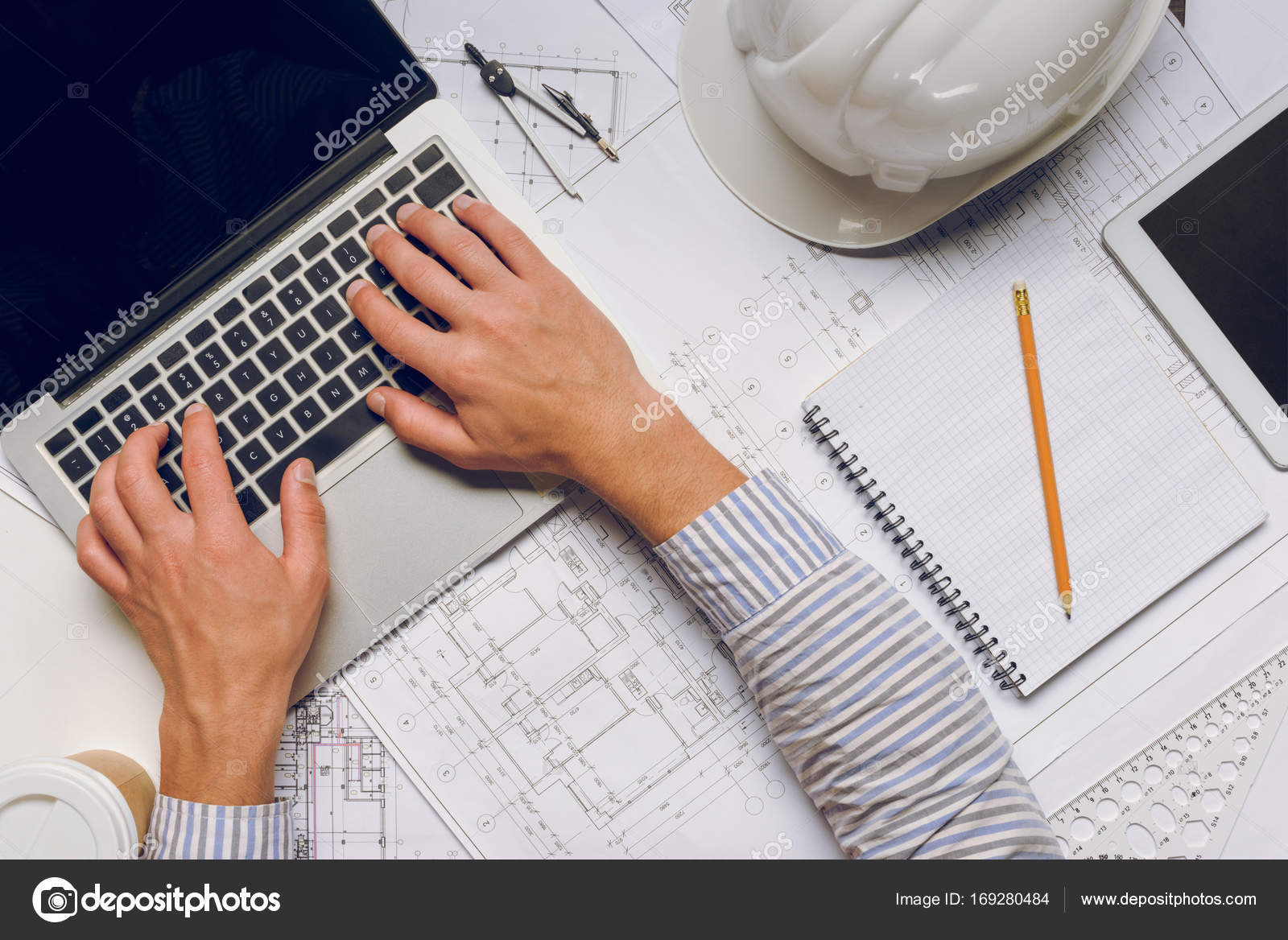Architect working on laptop — Stock Photo © VadimVasenin #169280484 Architect working on laptop — Stock Photo © VadimVasenin #169280484