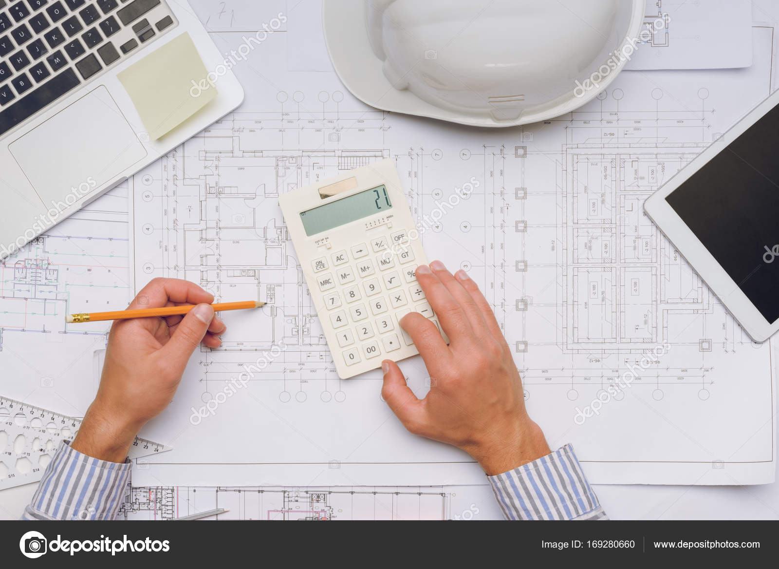 Architect working with blueprints and calculator — Stock Photo ...