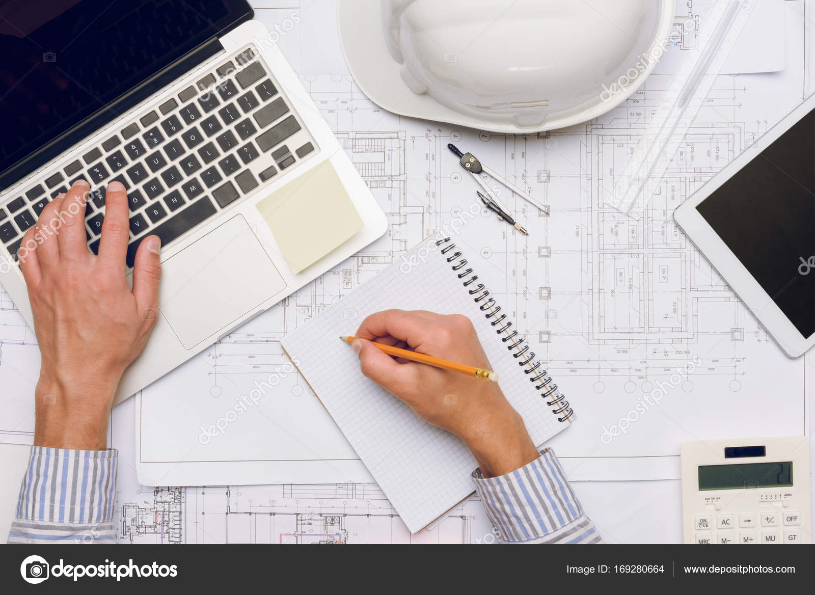 Architect working on laptop — Stock Photo © VadimVasenin #169280664 Architect working on laptop — Stock Photo © VadimVasenin #169280664