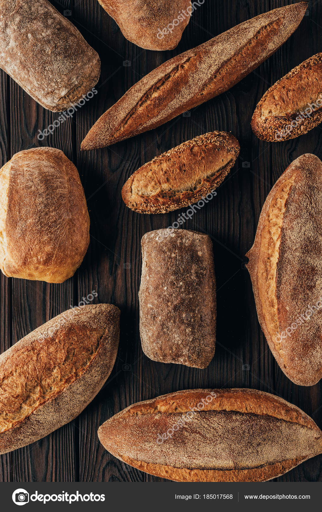 Top View Arranged Loafs Bread Wooden Surface Stock Photo by ...