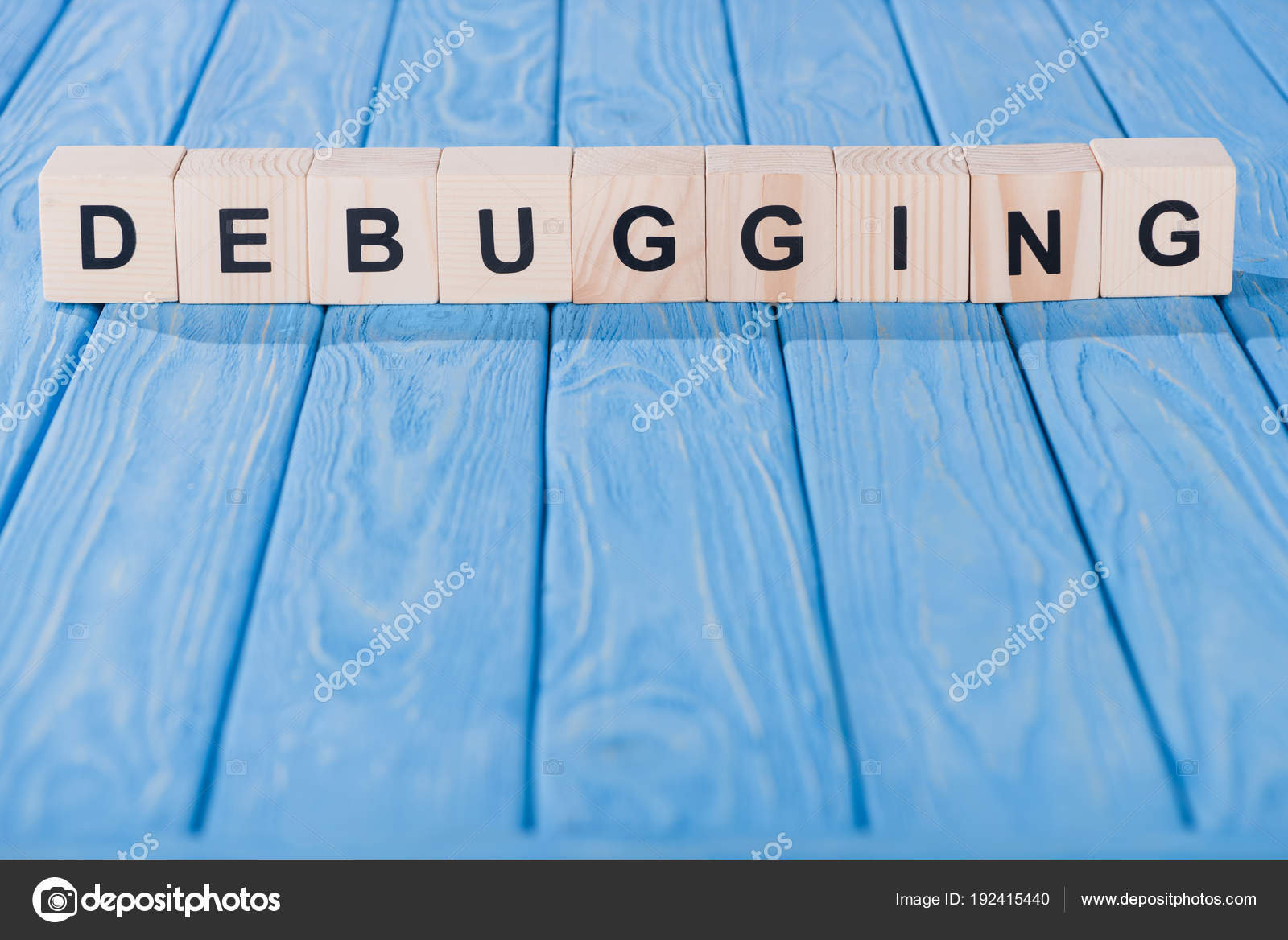 Close View Debugging Word Made Wooden Blocks Blue Tabletop — Stock Photo © VadimVasenin #192415440